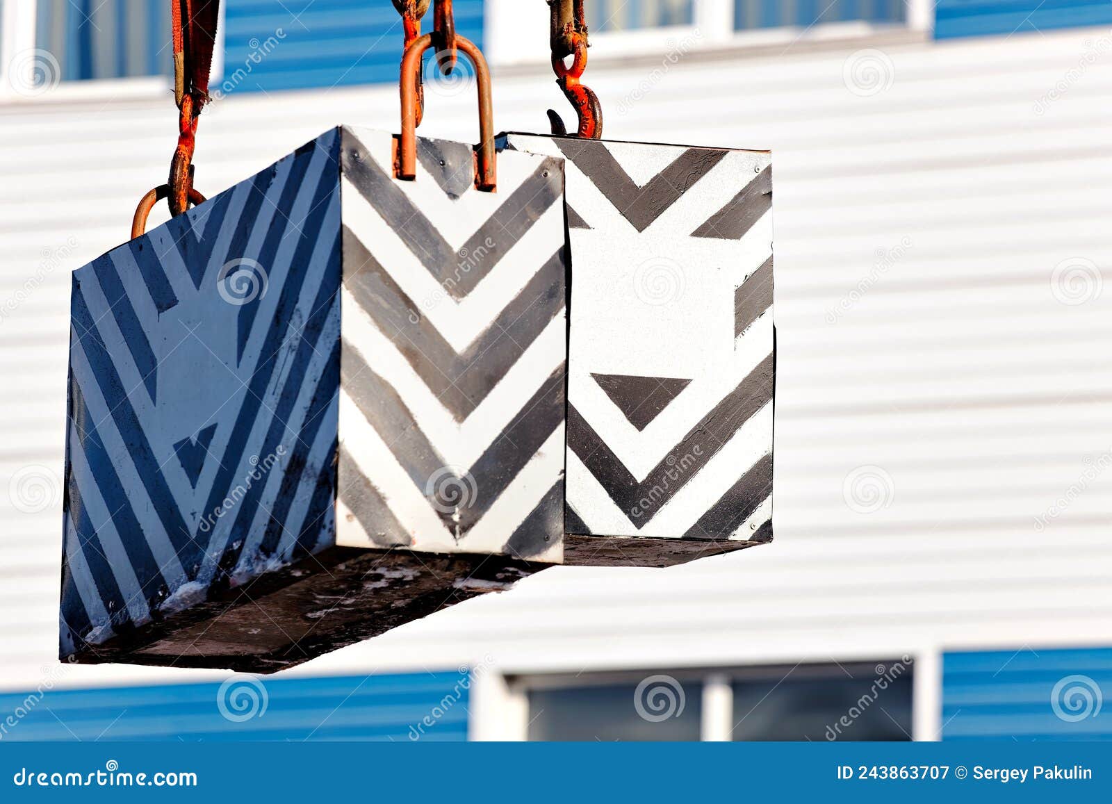 Heavy Load is Lifted on Slings with Hooks Outside on Sunny Day ...