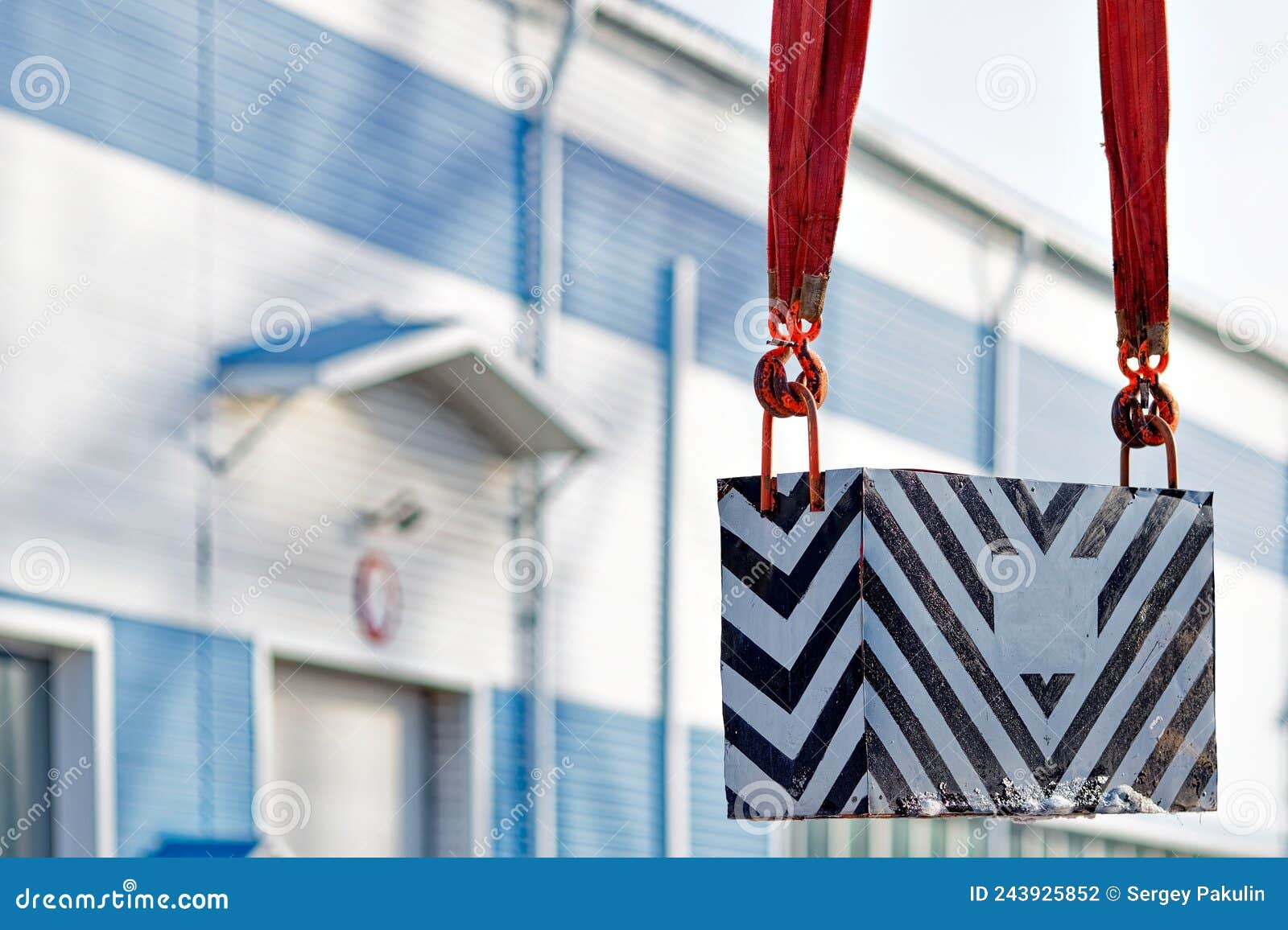 Heavy Load is Lifted on Slings with Hooks Outside on Sunny Day ...