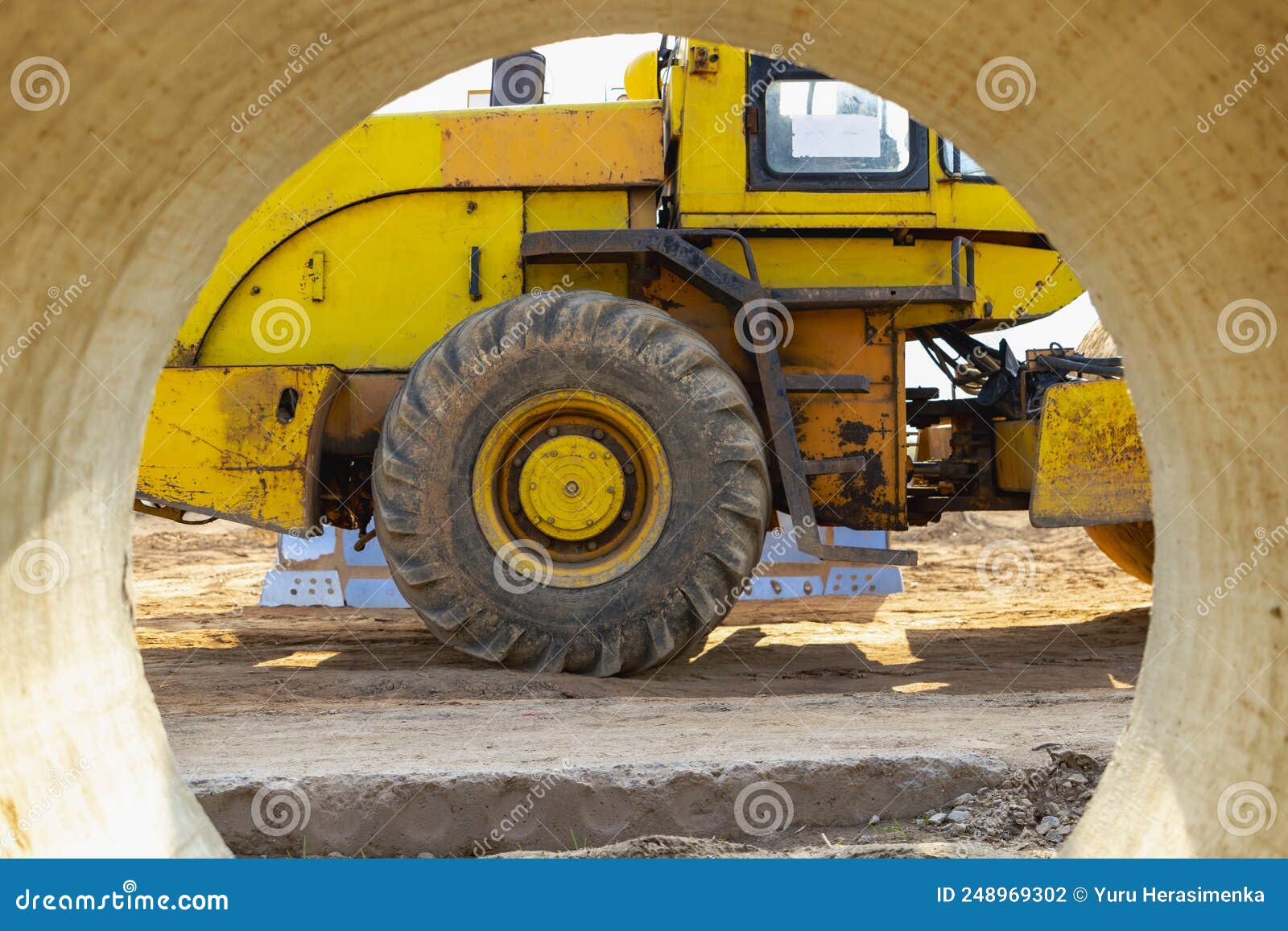 Heavy Loader at the Construction Site. View of the Wheel Loader through ...