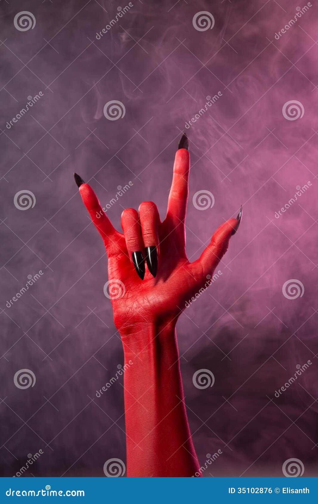 Heavy Metal, Red Devil Hand with Black Nails Stock Photo - Image of ...