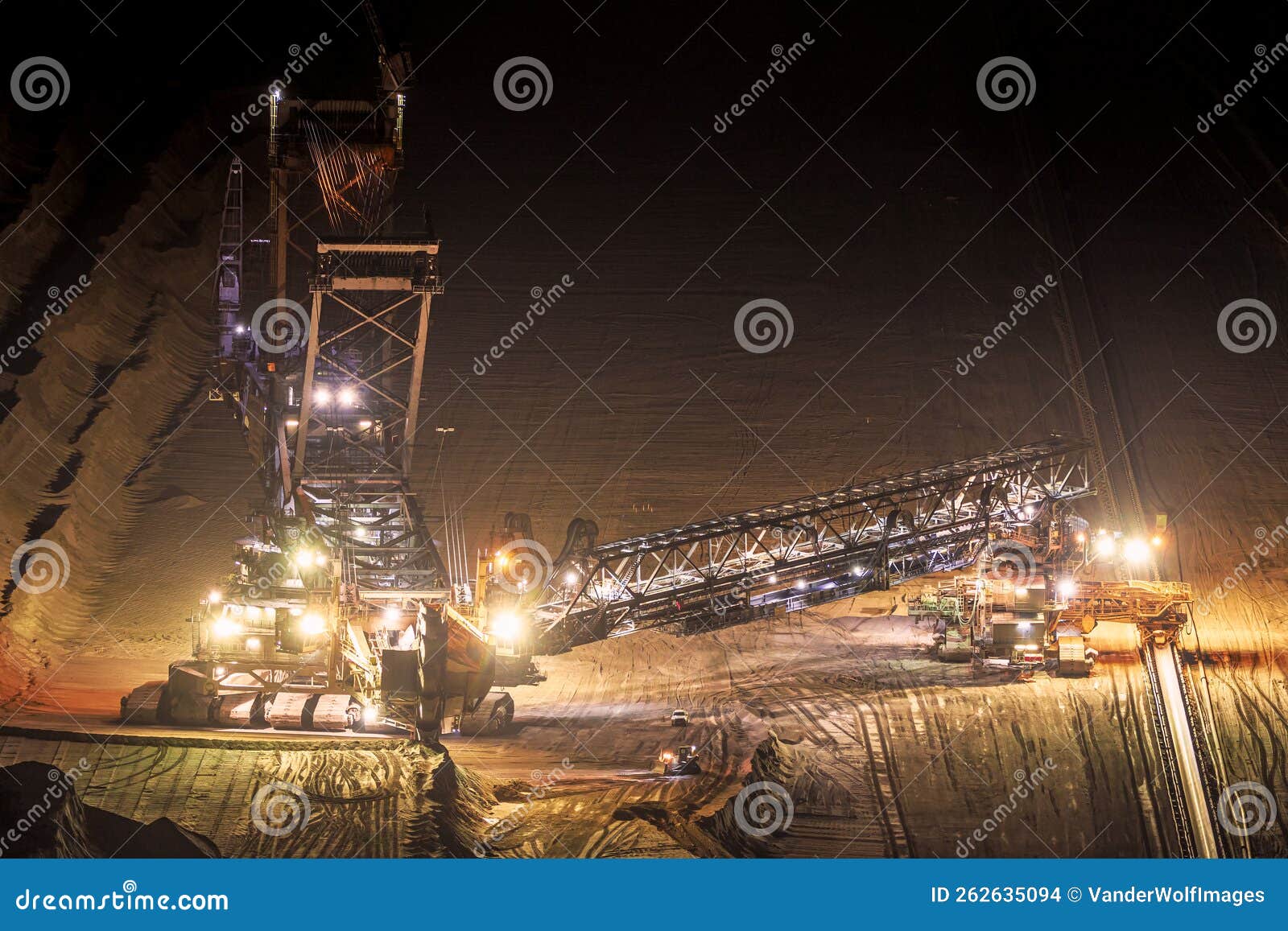 Heavy Mining Equipment at Work in an Open-pit Mine at Dusk Stock Photo ...