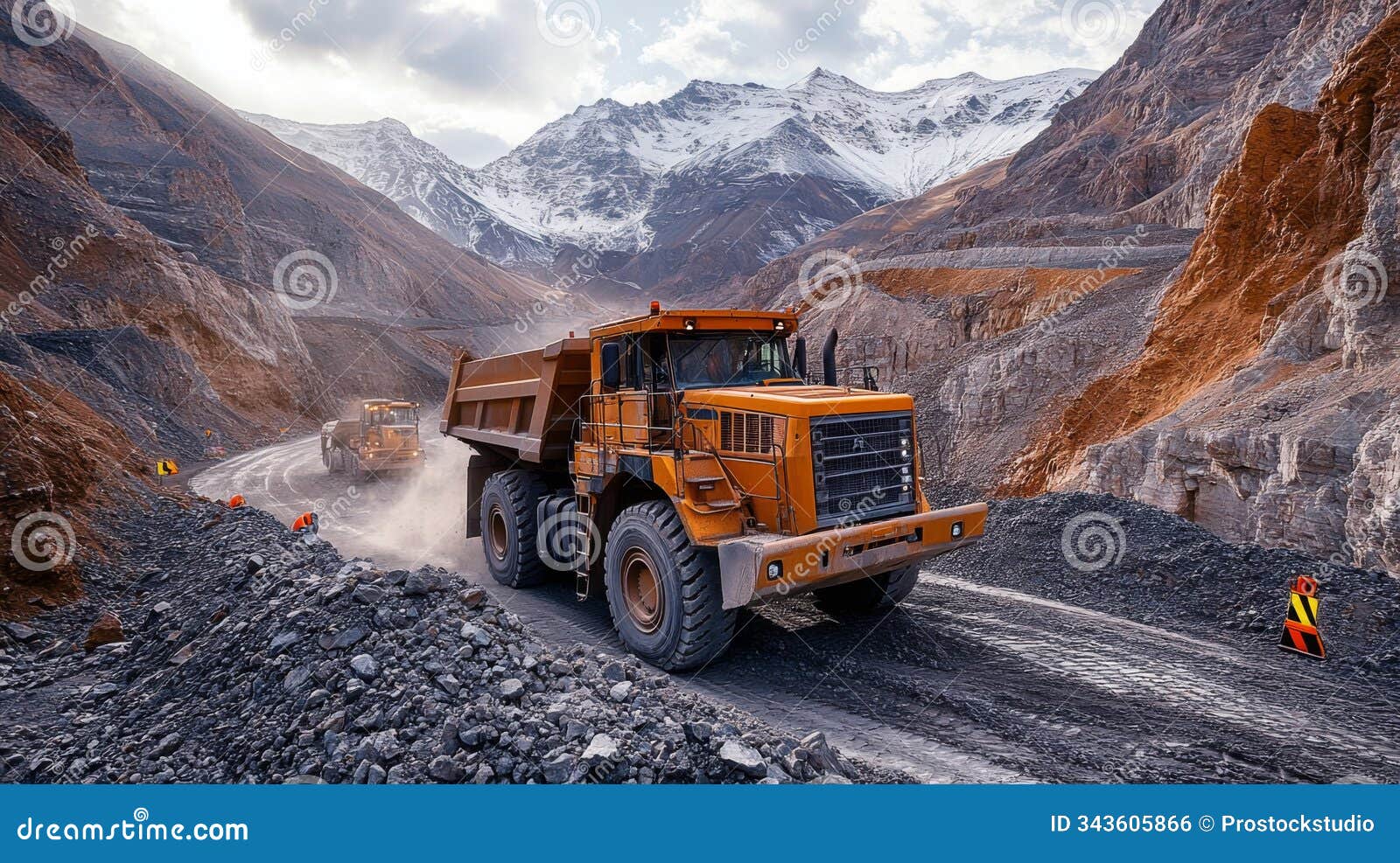 Heavy Mining Trucks Transporting Material through Mountainous Terrain ...