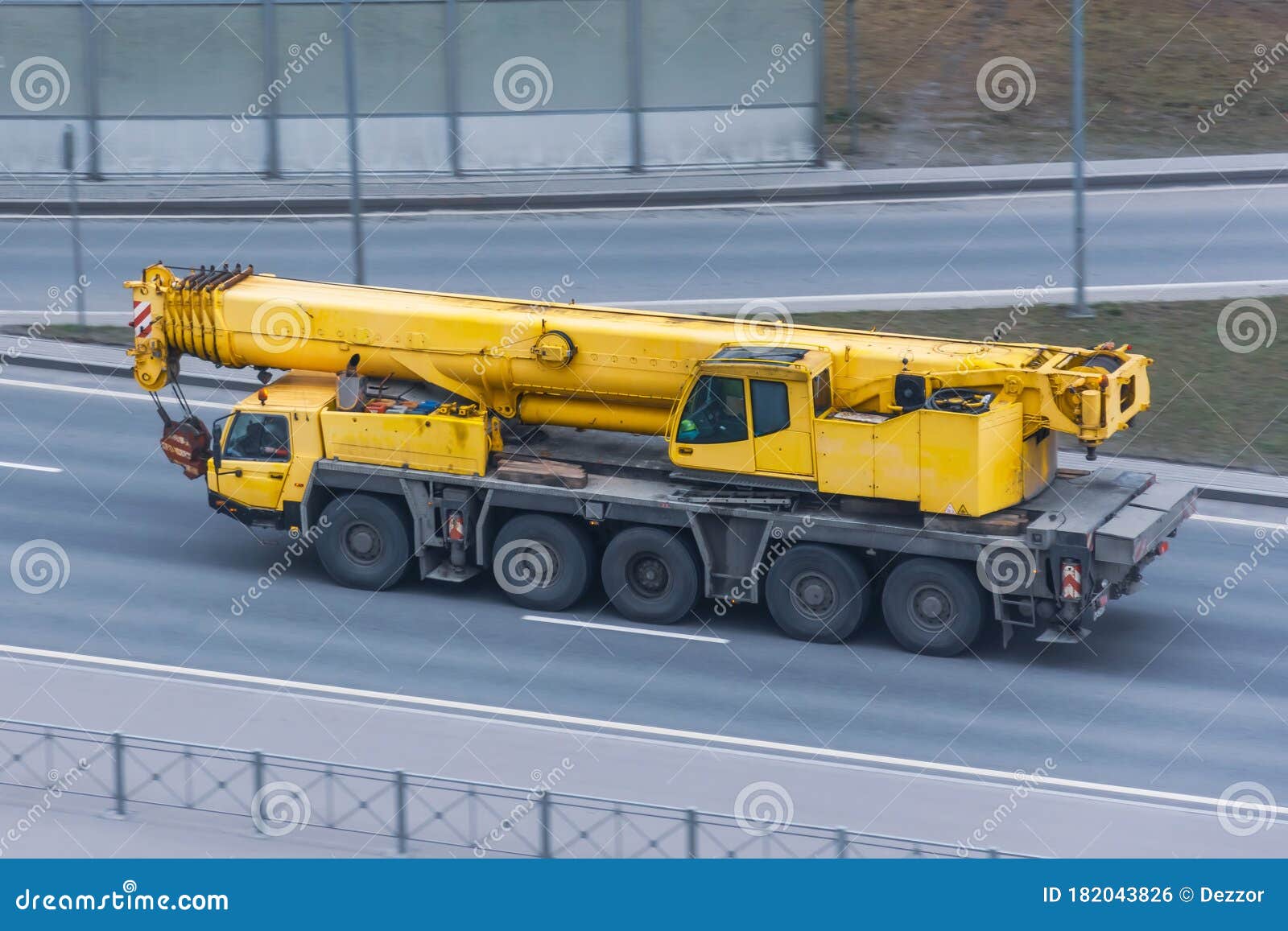 Heavy Mobile Crane with Folding Boom Construction Rides on a City ...