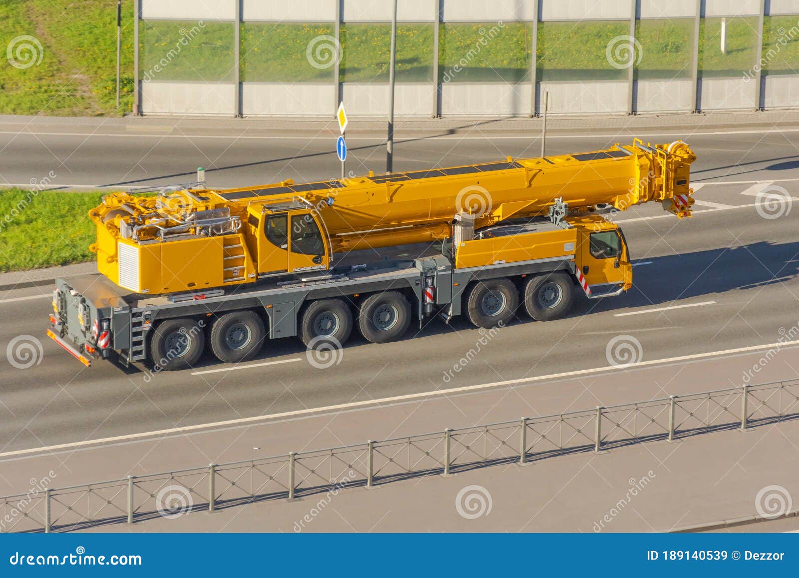 Heavy Mobile Crane With Folding Boom Construction Rides On A City ...