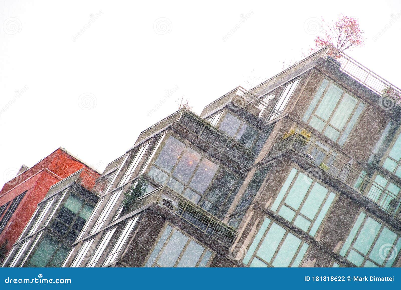 Abstract Angled Image of City Apartments Building with Heavy Snow Storm ...