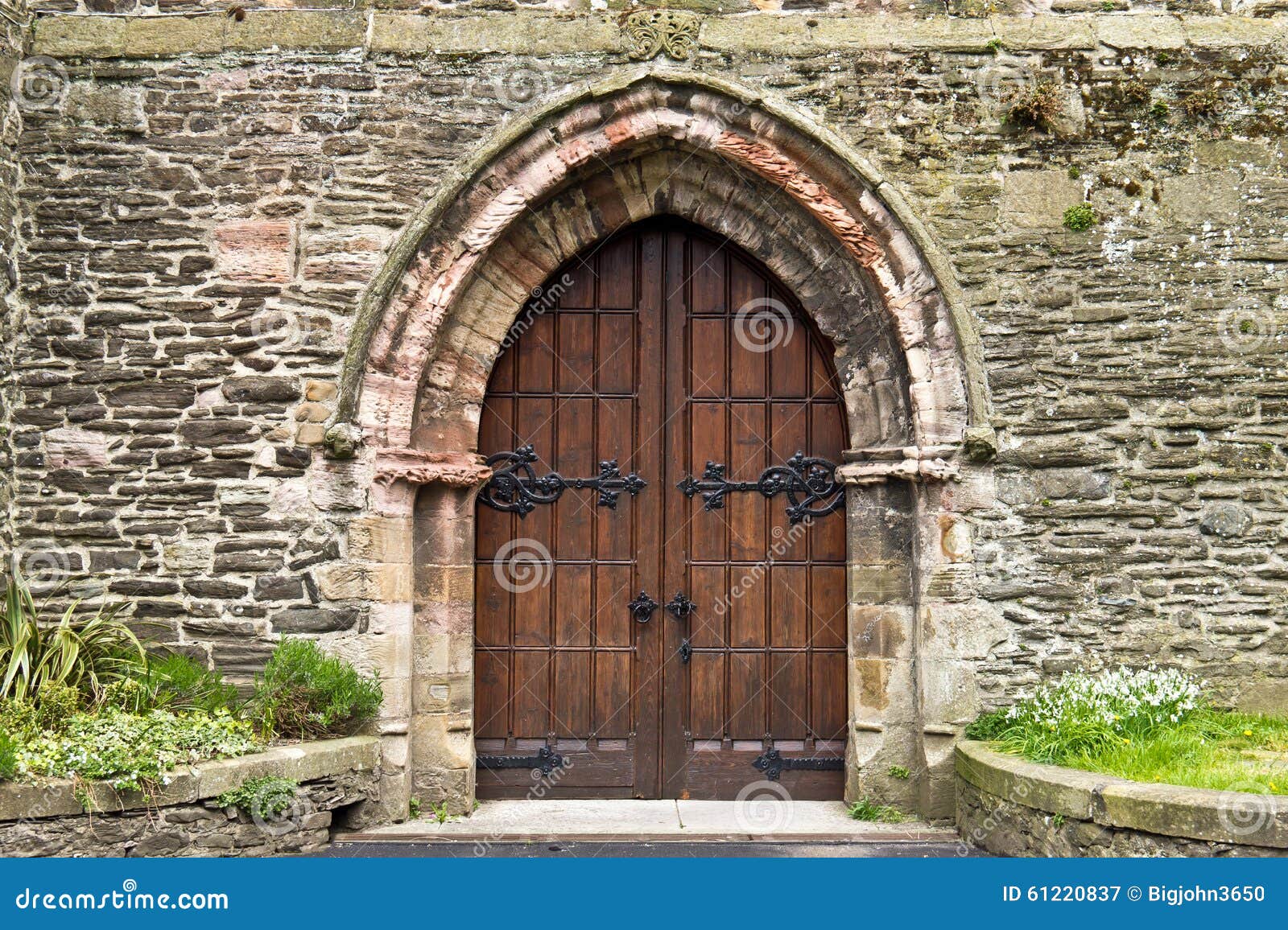 Heavy Ornate Wooden Doors in Old Stone Building Stock Image - Image of ...