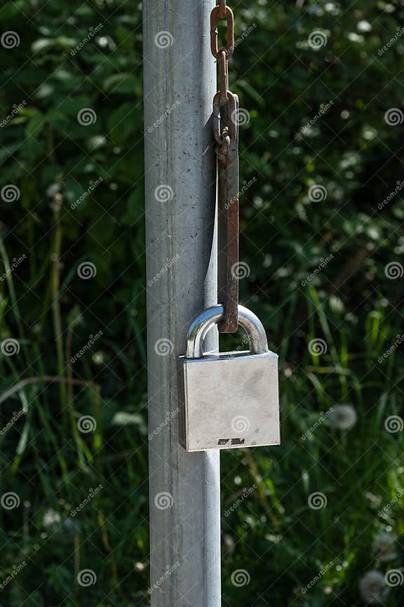 Heavy Padlock Hanging from a Pole.. Stock Photo - Image of protect ...