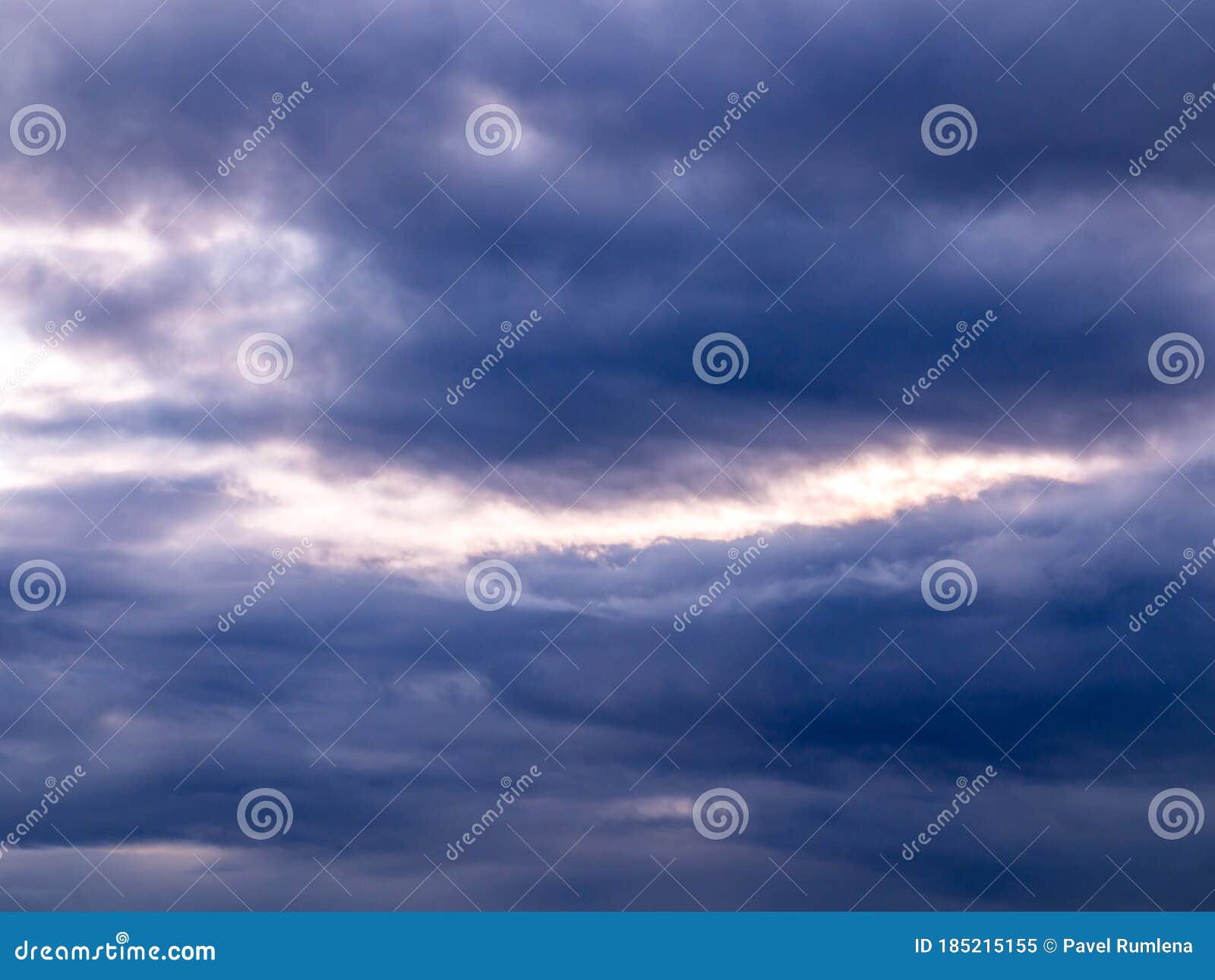 Heavy Rain Clouds and Bright Rift in the Sky Stock Image - Image of ...