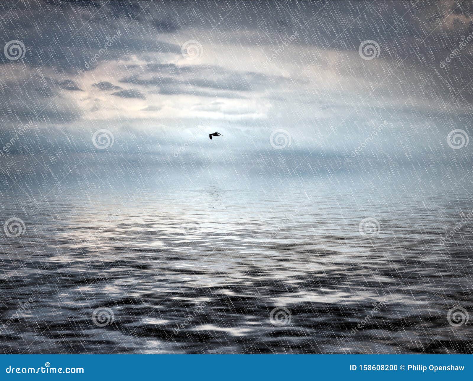 Heavy Rain Falling on a Dark Sea with Dramatic Storm Clouds Reflected ...