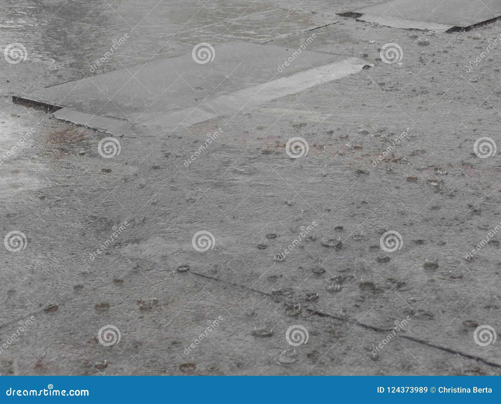 Heavy Rain Falling on the Pavement Stock Image - Image of flood ...