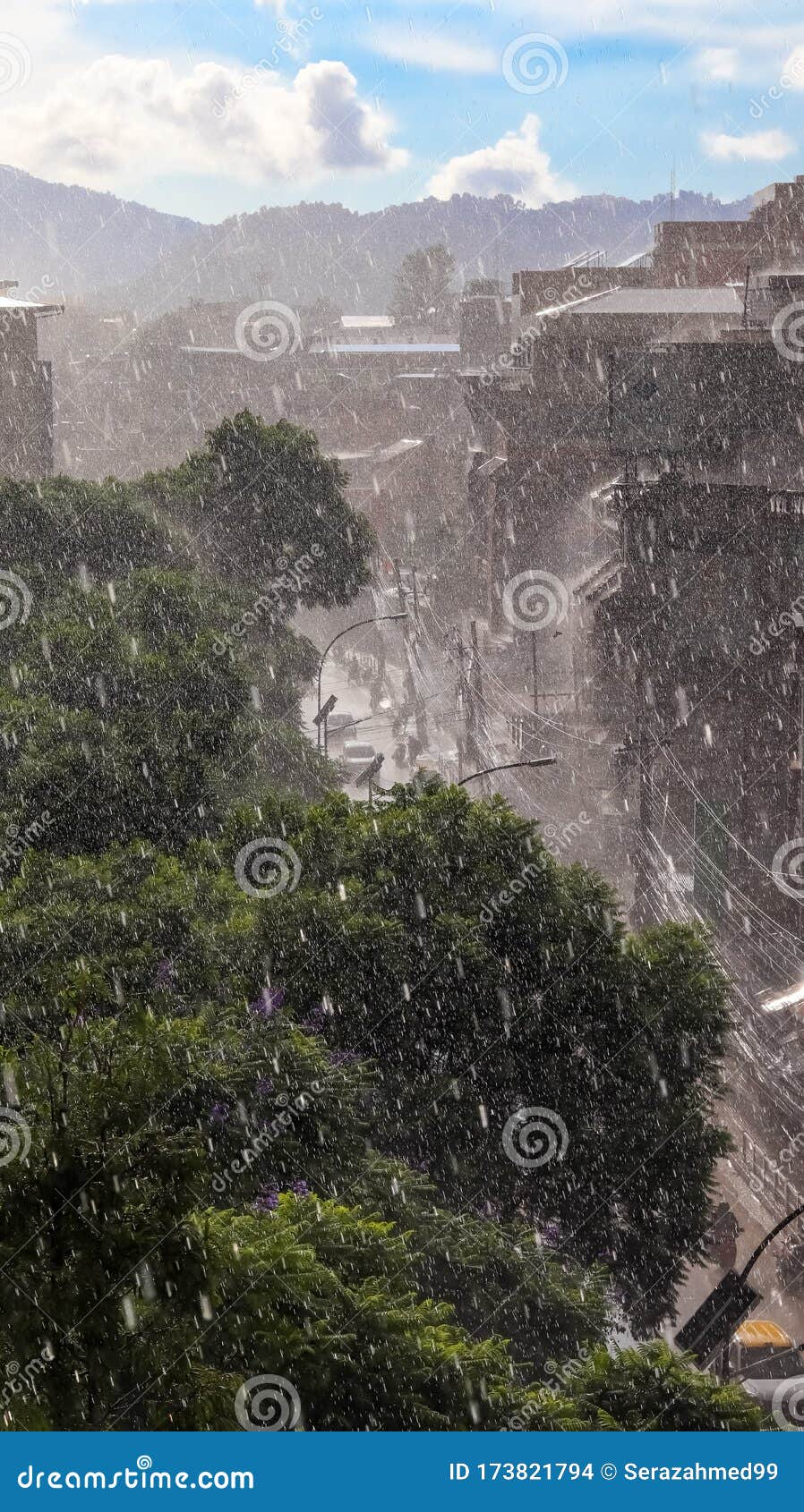 Heavy Rain Storm with Blue Sky in the Backdrop Stock Photo - Image of ...