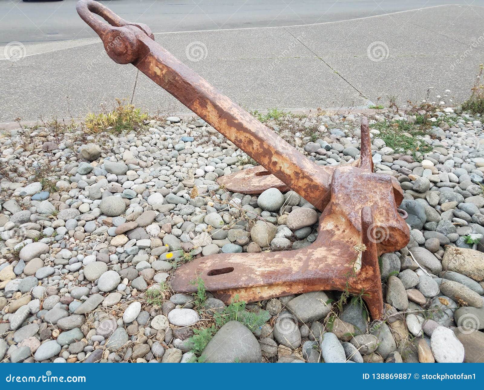 Heavy Rusty Iron Anchor on Stones or Rocks Stock Image - Image of heavy ...