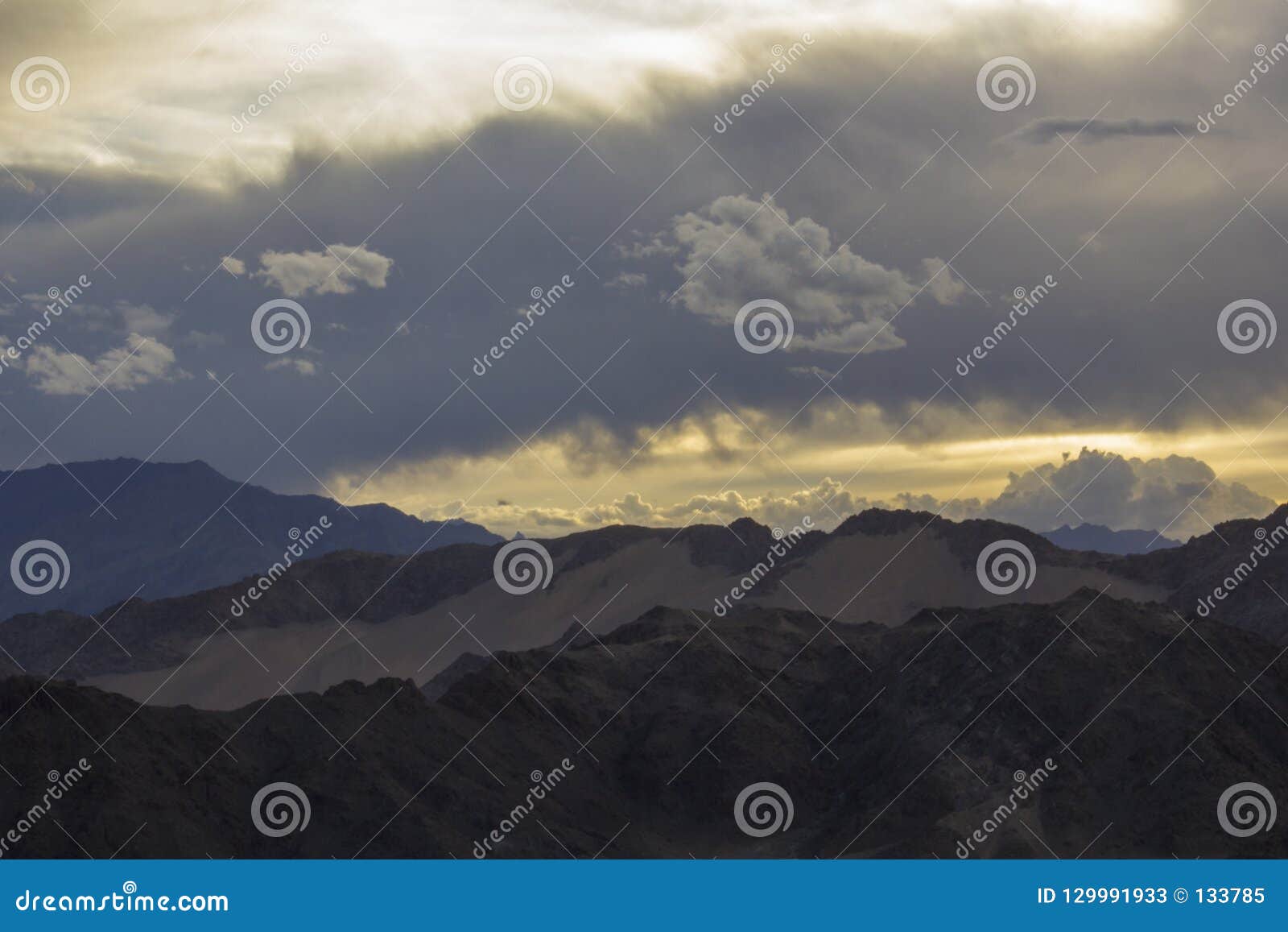 A Heavy Sunset Sky Over the Desert Mountain Ranges Stock Image - Image ...