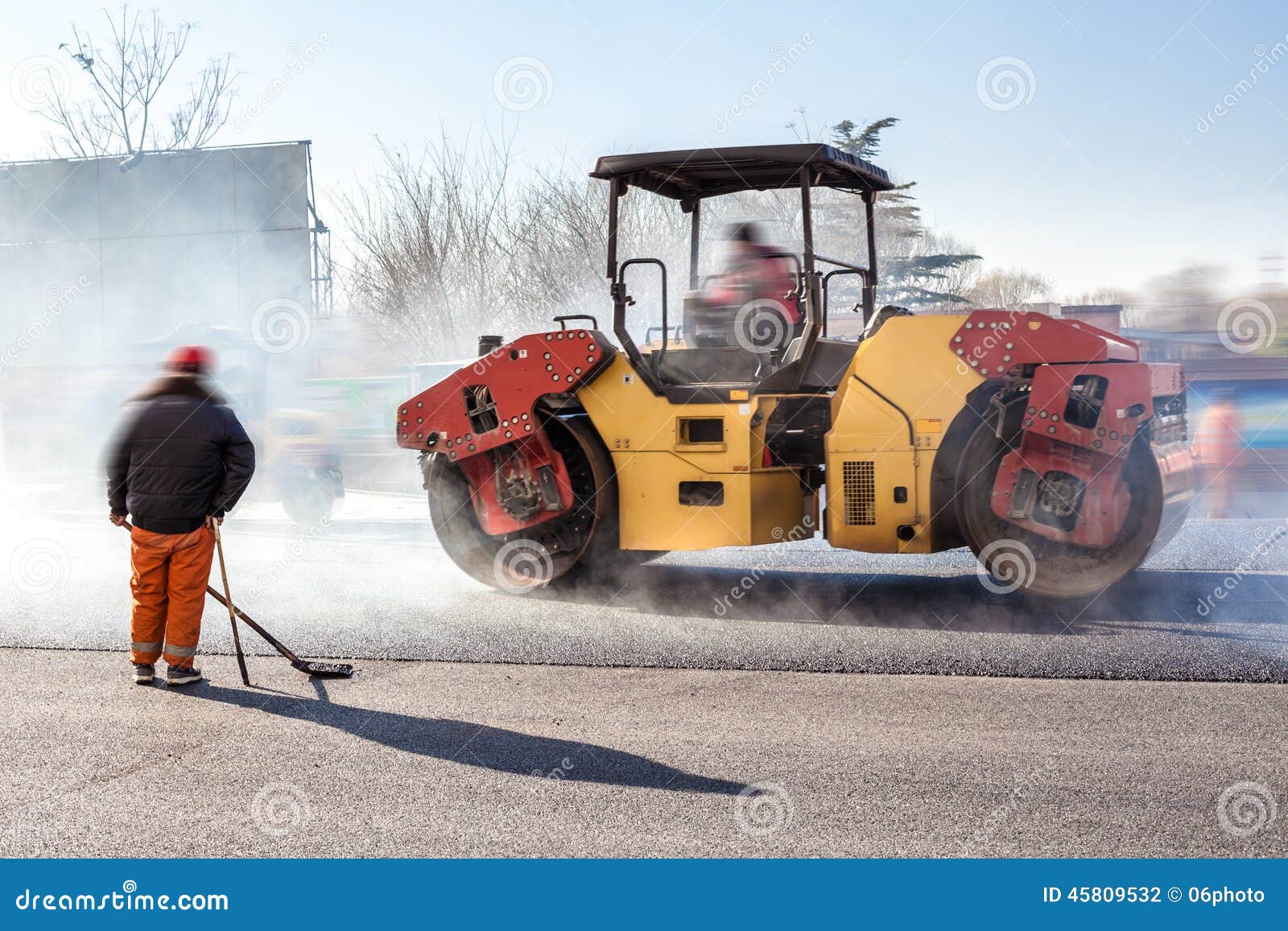 Heavy Vibration Yellow Steamroller Or Soil Compactor Working On Hot-mix ...