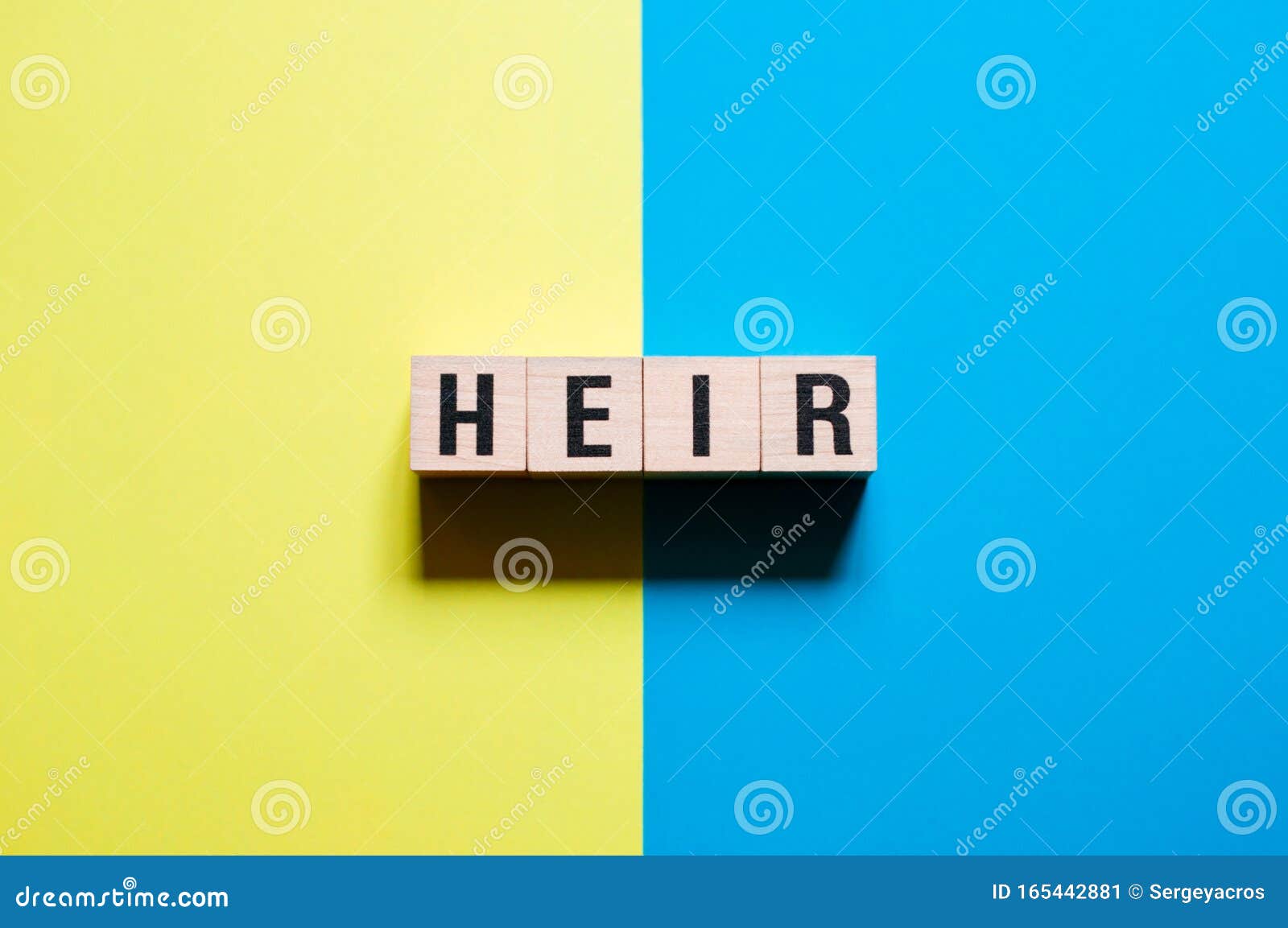 Heir word concept on cubes stock image. Image of earn - 165442881