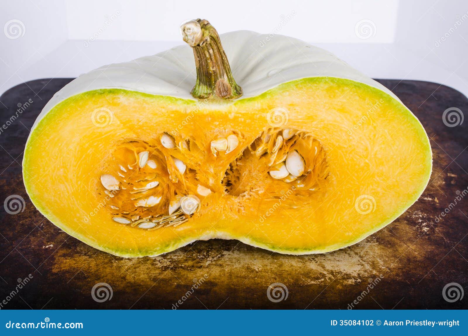 Heirloom Pumpkin Halve on White Stock Photo - Image of harvest, orange ...