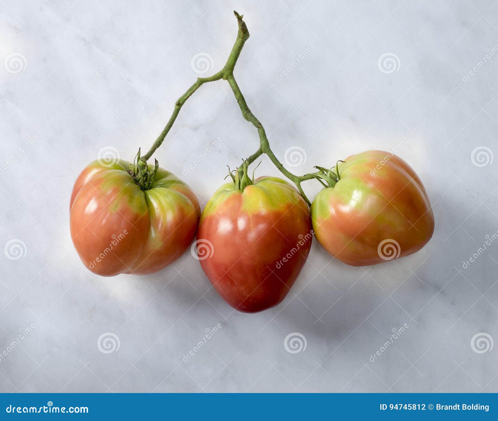 Heirloom Tomatoes on a Marble Surface Stock Photo - Image of table ...