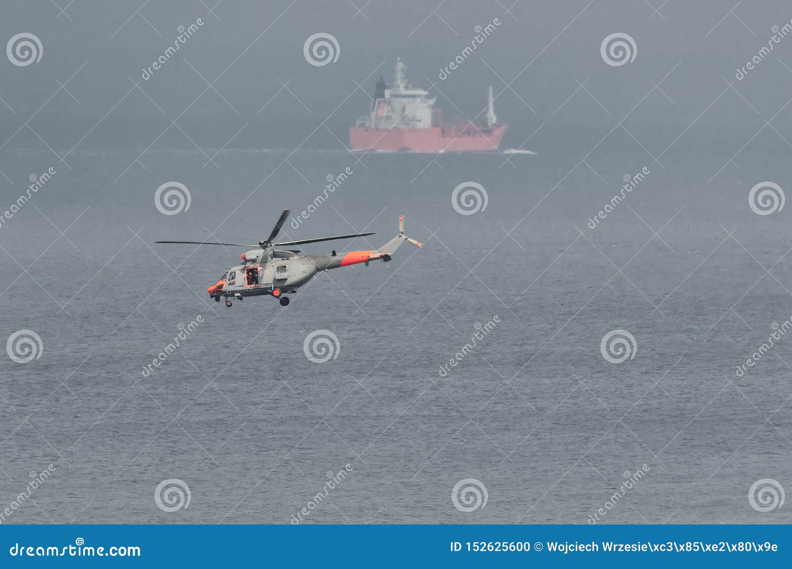 HELICOPTER and SHIP stock photo. Image of forces, firm - 152625600