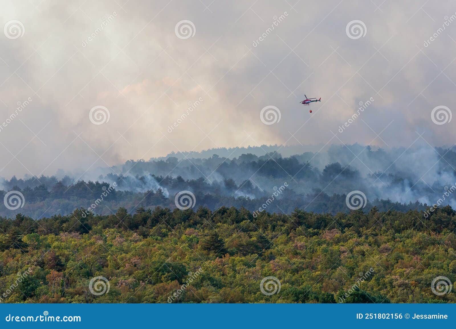 Helicopter Against Wildfire during Strong Wind and Drought Stock Photo ...