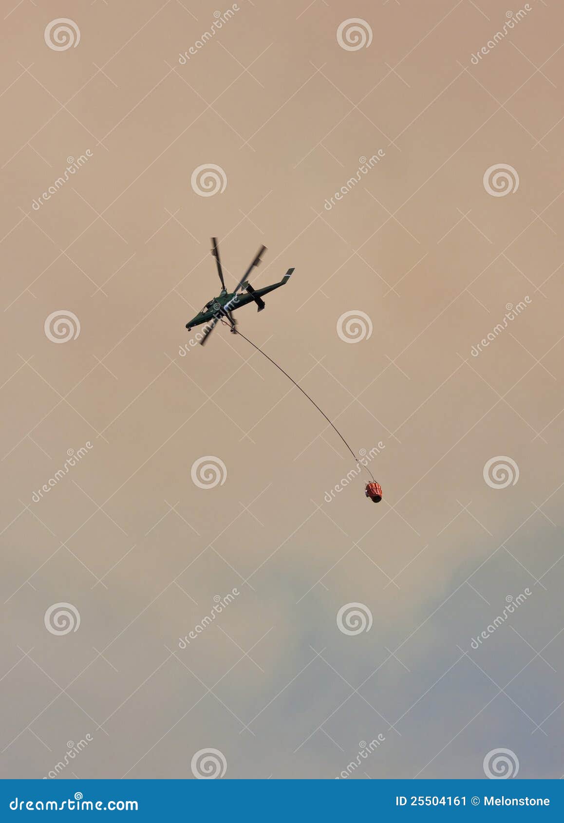 Helicopter Carrying Helibucket Stock Image - Image of carrying, cloud ...