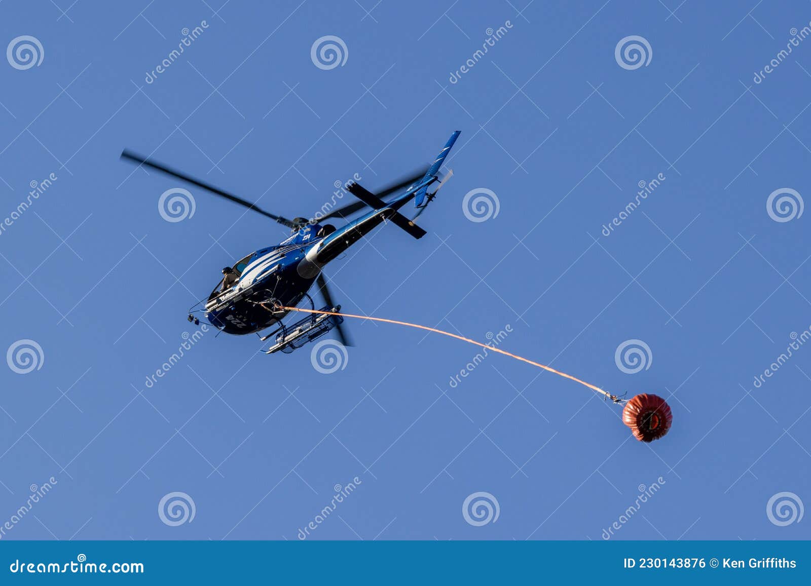 Helicopter Carrying Water Bucket Stock Photo - Image of water, forest ...