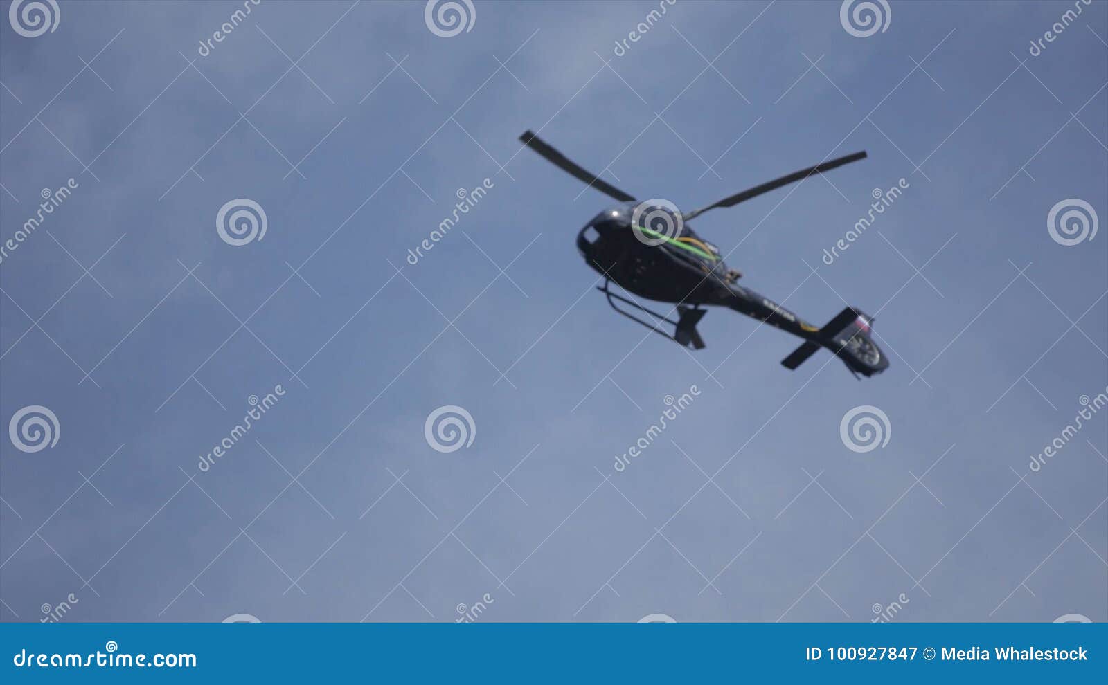 Helicopter in the Cloudy Sky with Lightning. Helicopter from Below ...