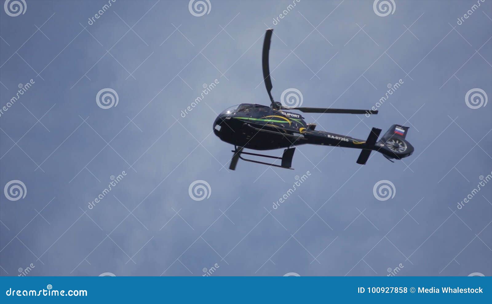 Helicopter in the Cloudy Sky with Lightning. Helicopter from Below ...