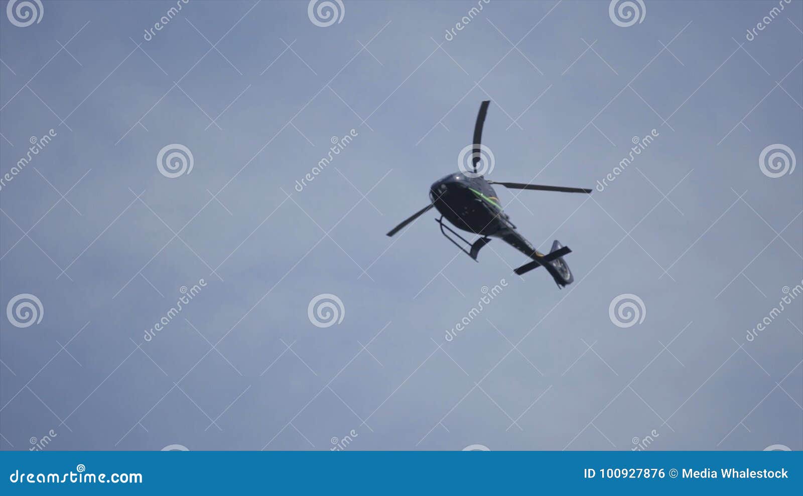 Helicopter in the Cloudy Sky with Lightning. Helicopter from Below ...
