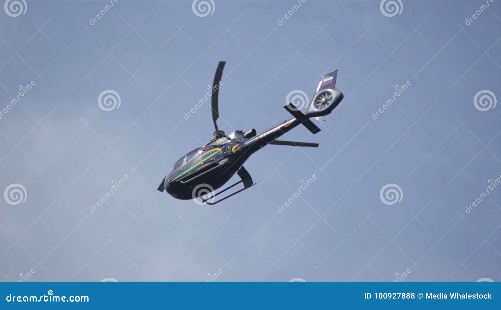 Helicopter in the Cloudy Sky with Lightning. Helicopter from Below ...