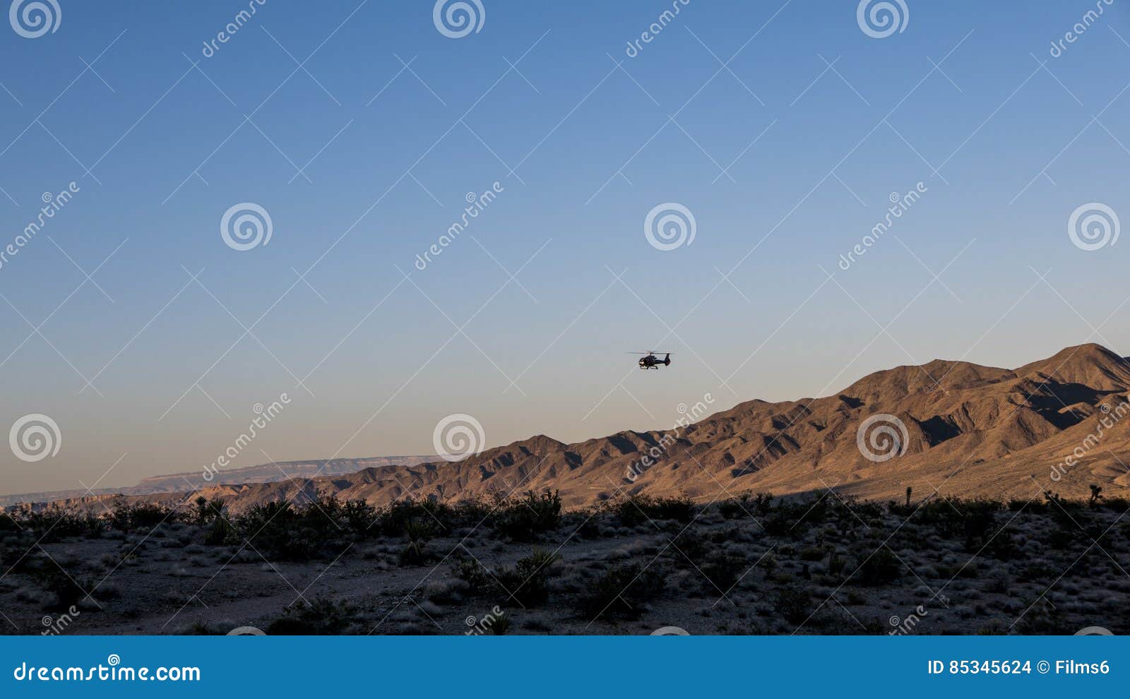 Helicopter in the desert stock photo. Image of nature - 85345624