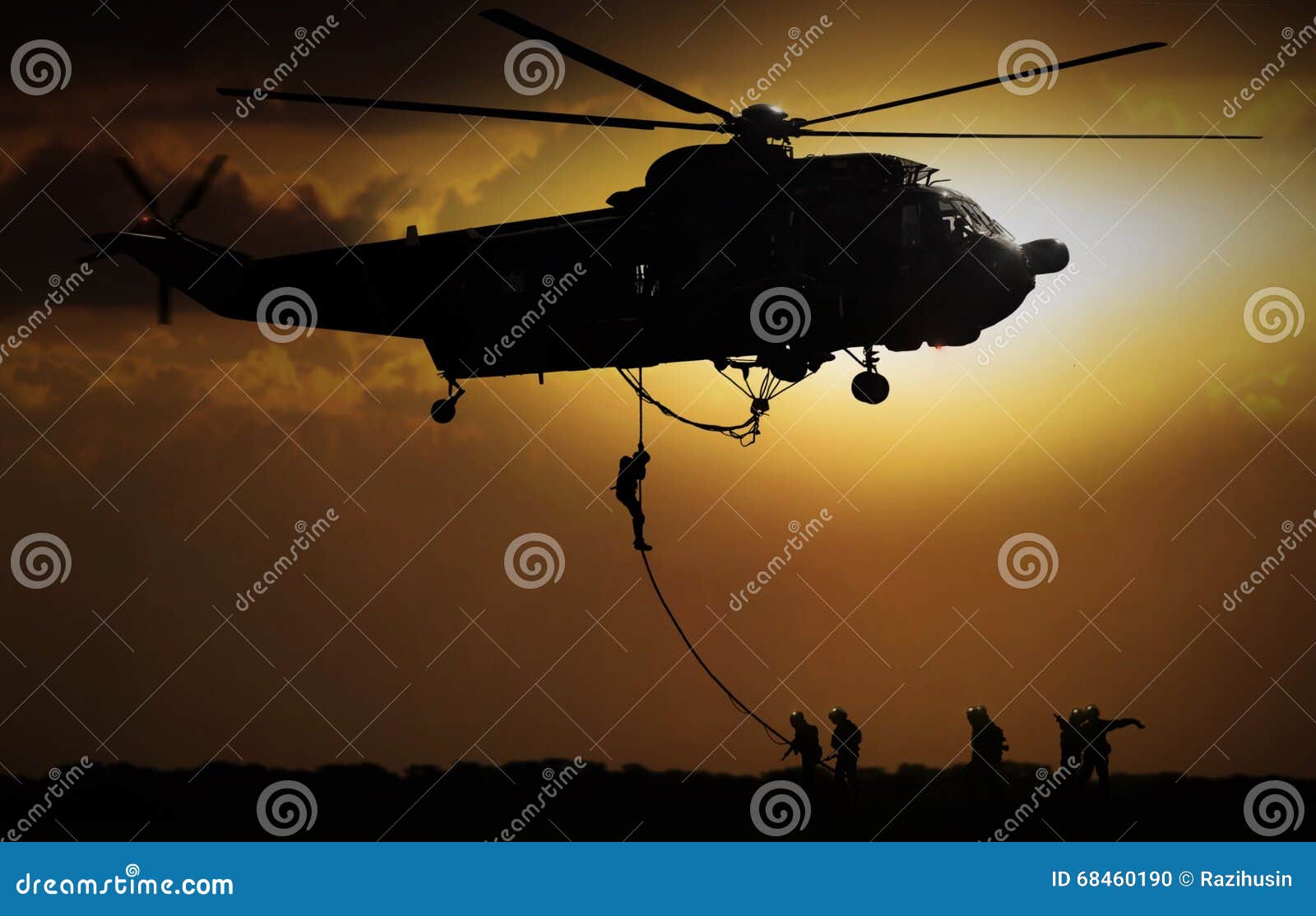 Helicopter Dropping Soldier during Sunset Stock Photo - Image of ...