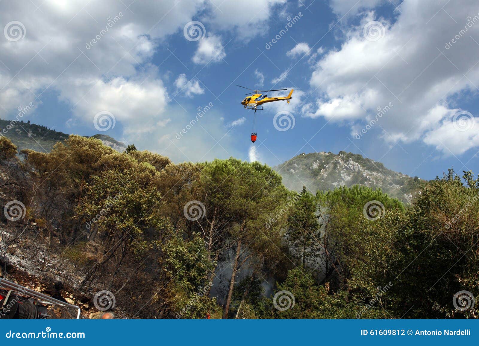 Helicopter fire water jet stock photo. Image of water - 61609812