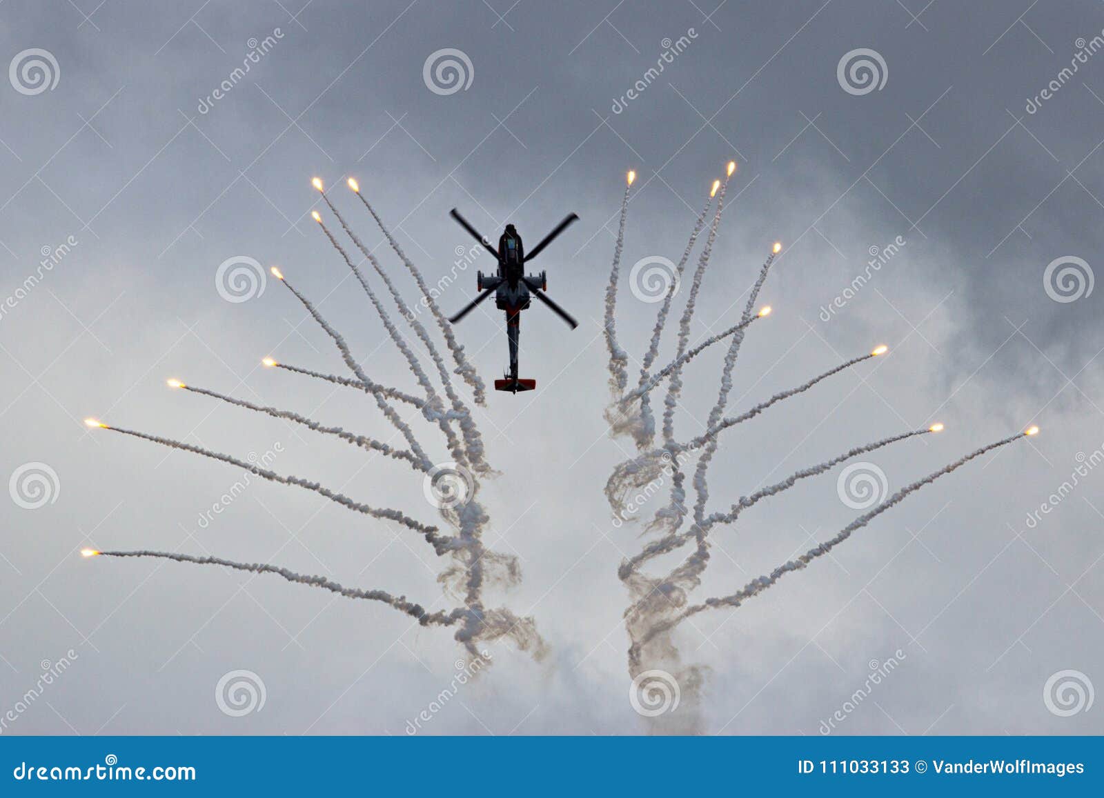 Helicopter firing flares stock image. Image of military - 111033133