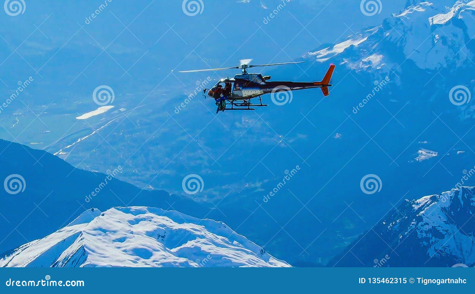 A Helicopter Fly Over Mountains in Alps Stock Image - Image of peak ...