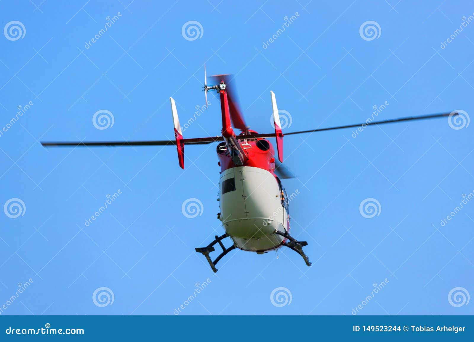 Helicopter Flying from Behind Stock Photo - Image of rotor, service ...