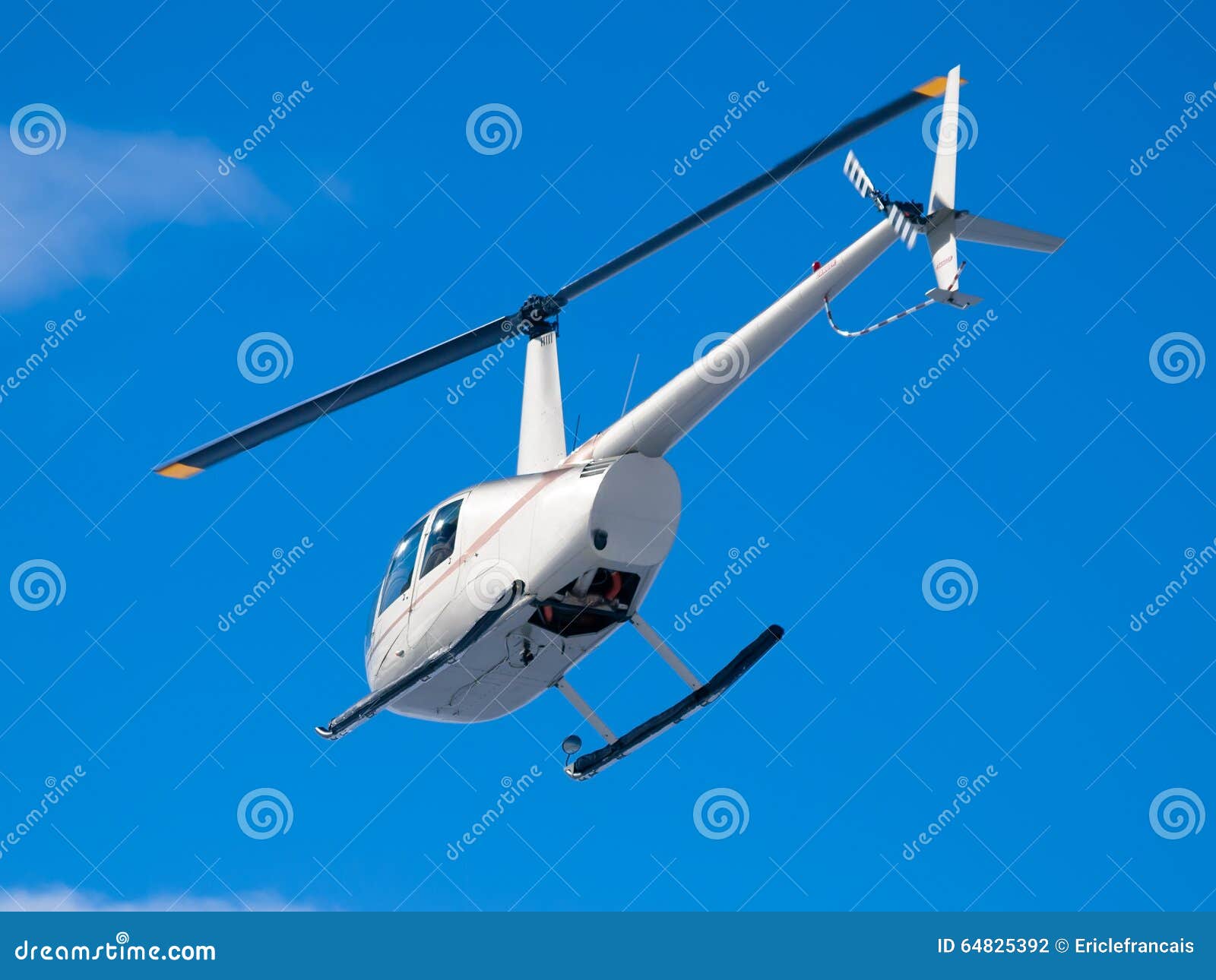 Helicopter Flying in Blue Sky View from Under and Behind Stock Photo ...