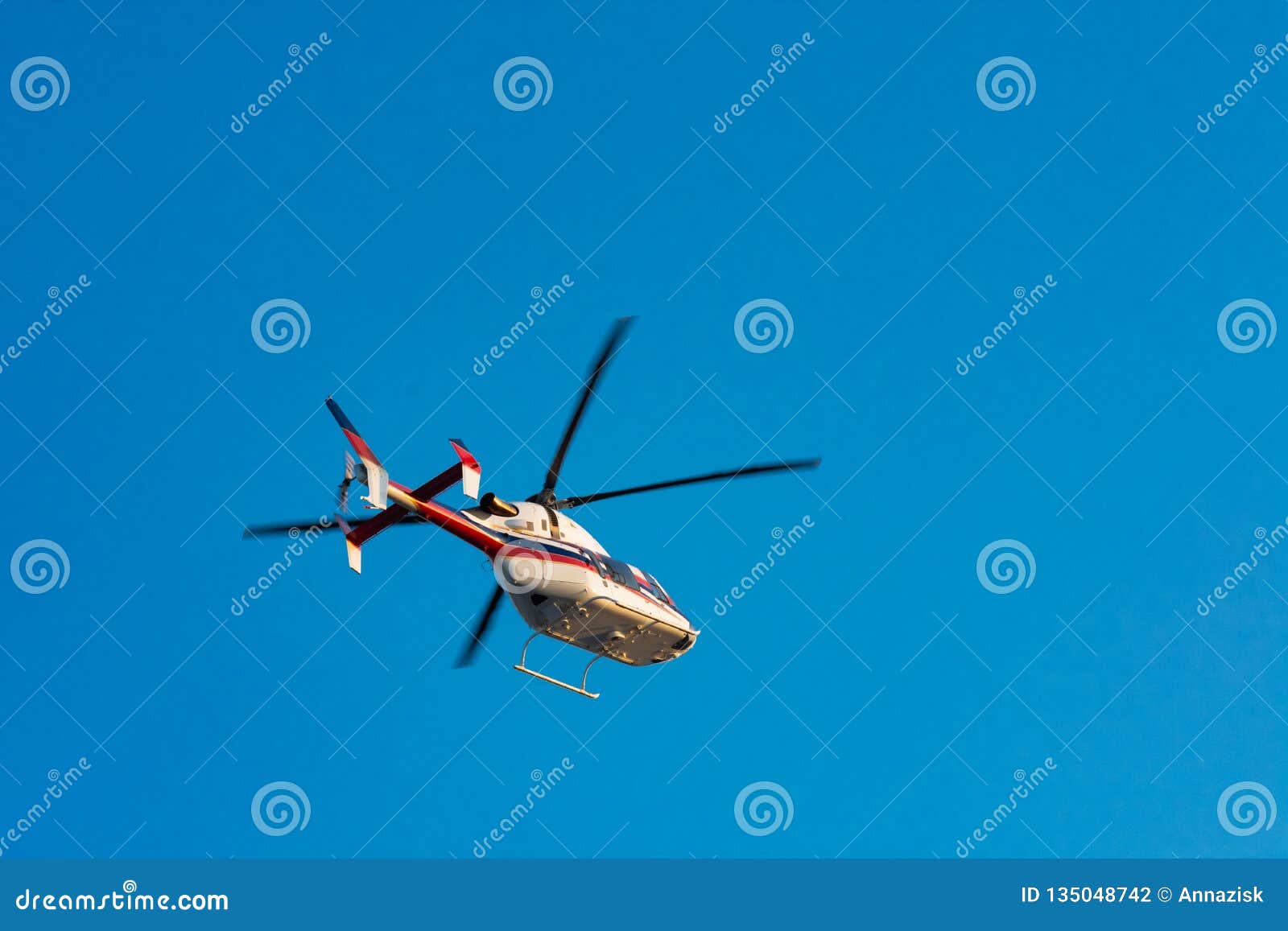Helicopter Flying High in Sky Stock Photo - Image of action, flight ...