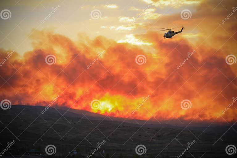 Helicopter Flying Over Fire Stock Image - Image of smoke, devastation ...