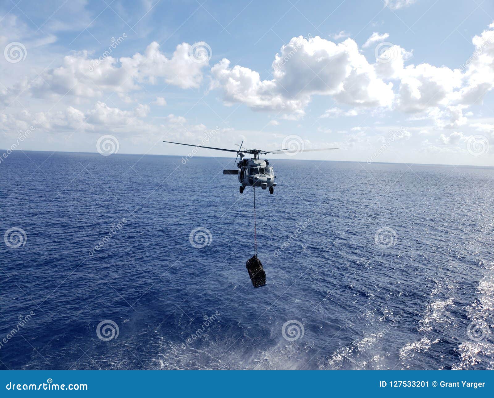 Helicopter Flying Over the Ocean. Editorial Photo - Image of ...