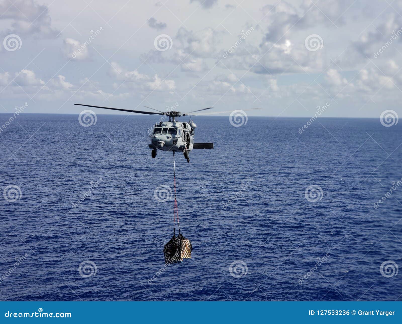 US Navy Helicopter Flying Over the Ocean. Editorial Photo - Image of ...
