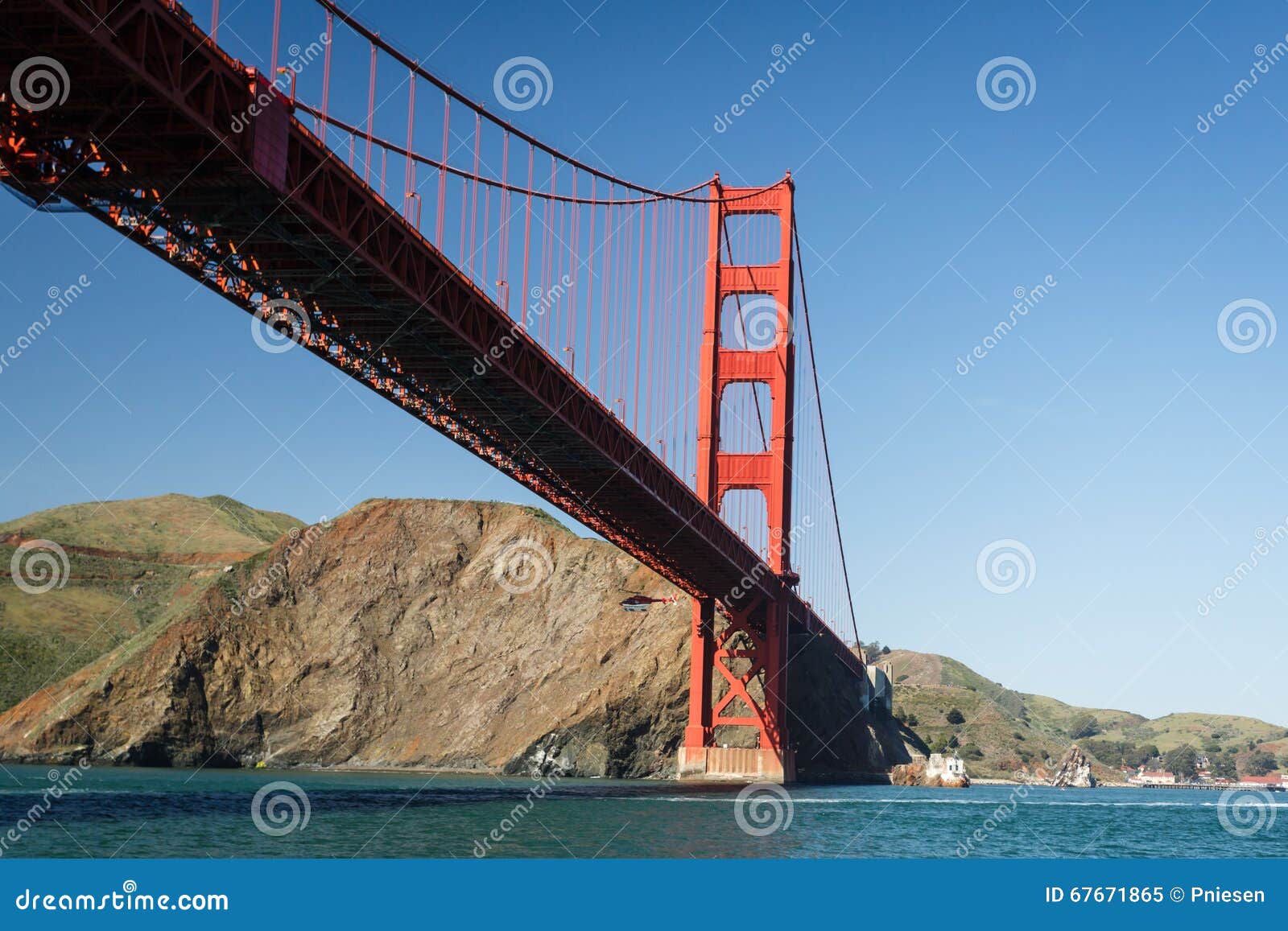 Helicopter Flying Under the Golden Gate Bridge Stock Image - Image of ...