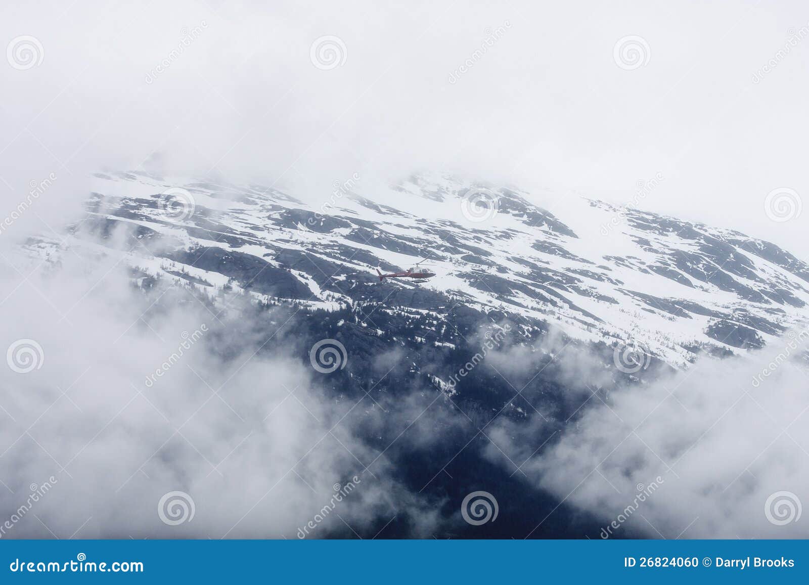 Helicopter through Fog Past Snow Covered Mountain Stock Photo - Image ...