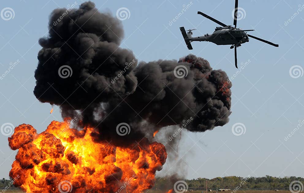 Helicopter in Ground Attack Stock Photo - Image of chopper, explosive ...