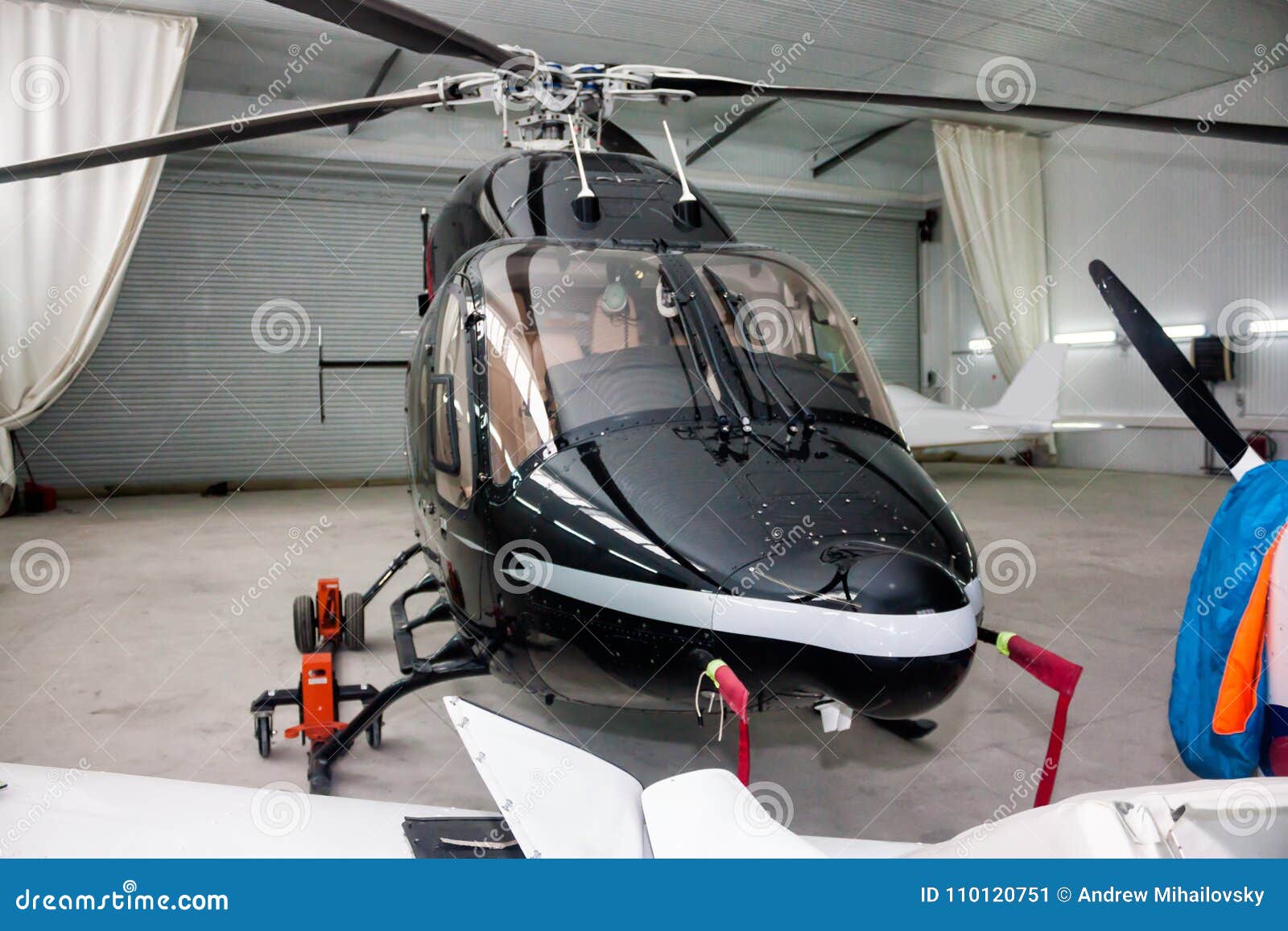Helicopter in the hangar stock image. Image of view - 110120751