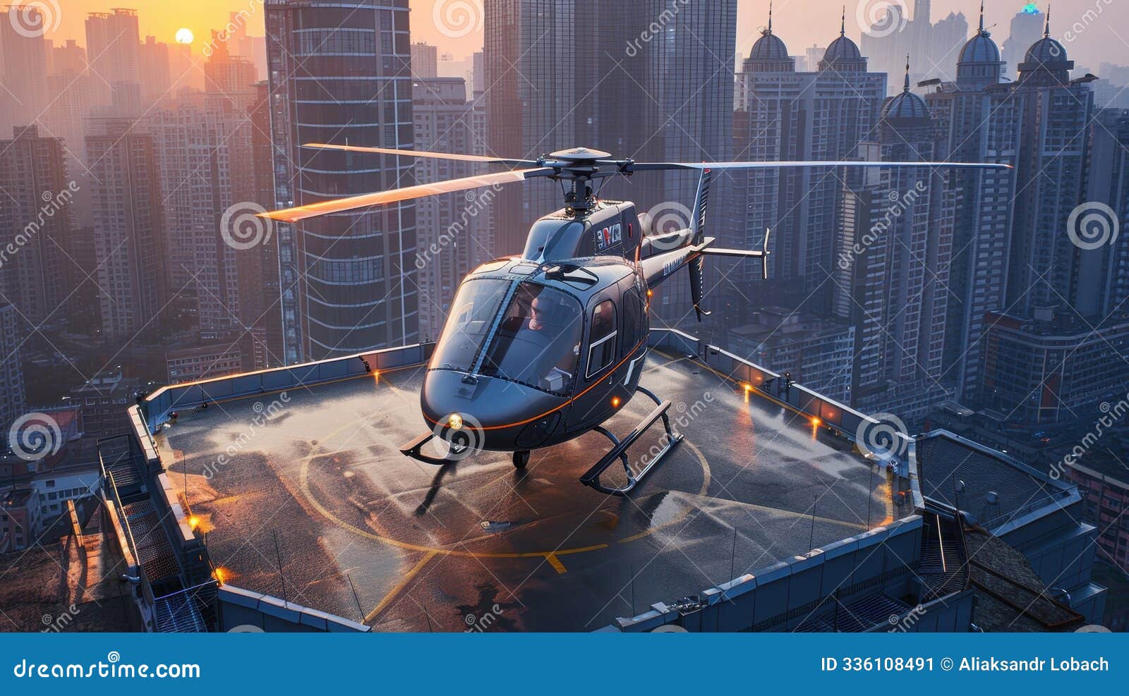 A Helicopter Landing on the Helipad of a Skyscraper. Building with a ...
