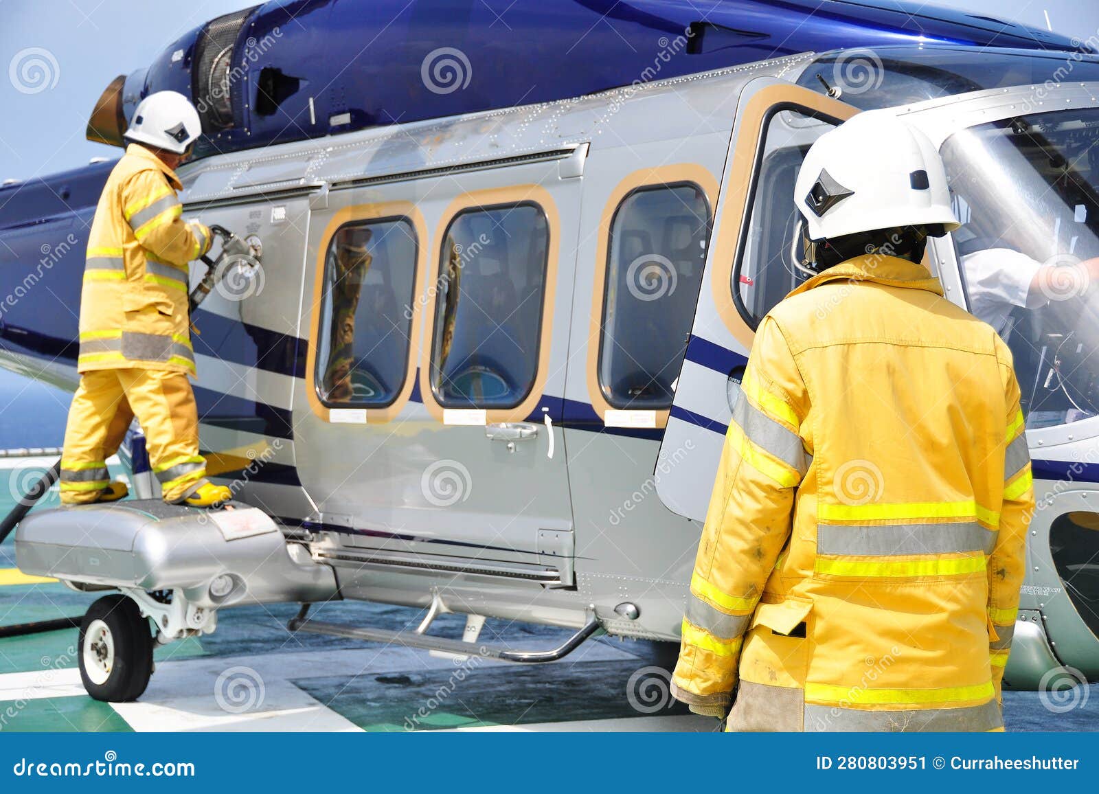 Helicopter Landing Officer Communicating with Pilot and Copilot for ...