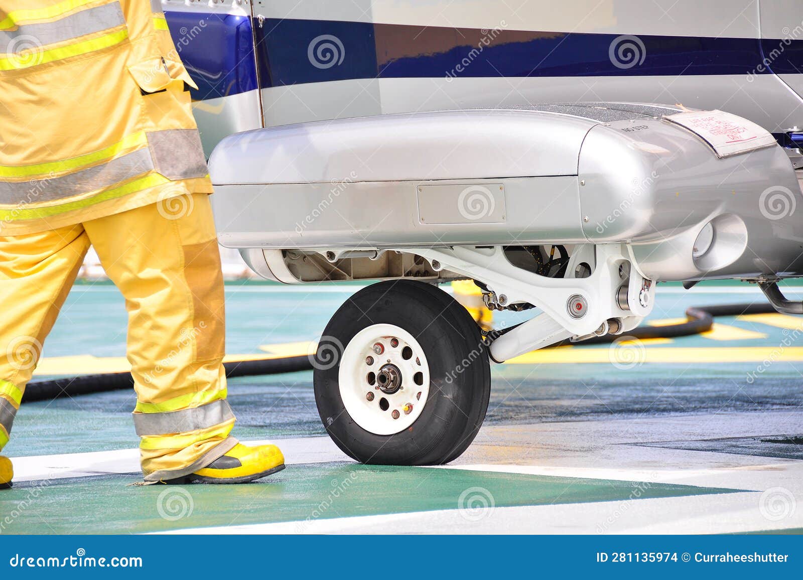 Helicopter Landing Officer Communicating with Pilot and Copilot for ...