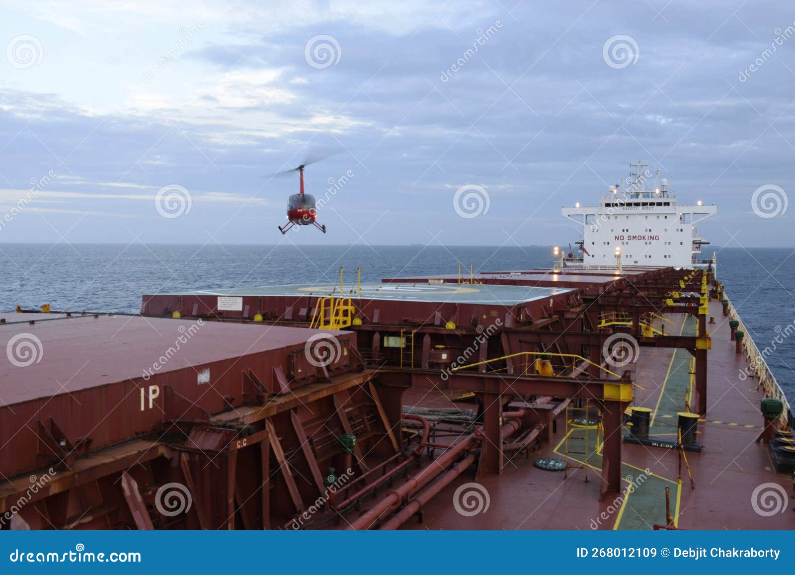 Helicopter landing on ship editorial stock image. Image of ship - 268012109