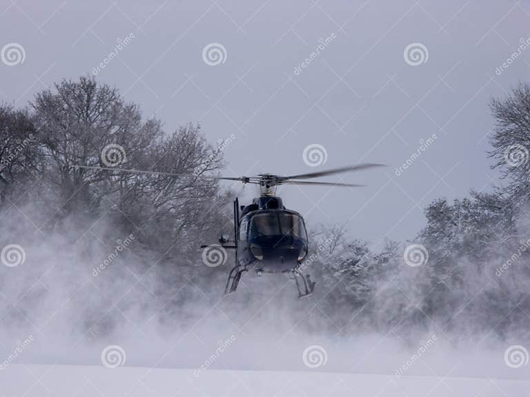Helicopter Landing in the Snow Stock Photo - Image of search, open ...