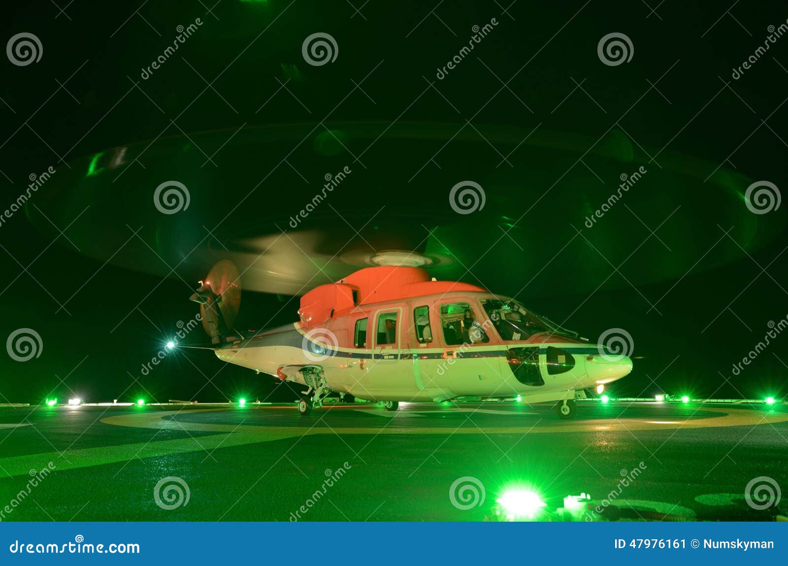 The Helicopter Night Landing on Offshore Oil Rig Stock Image - Image of ...